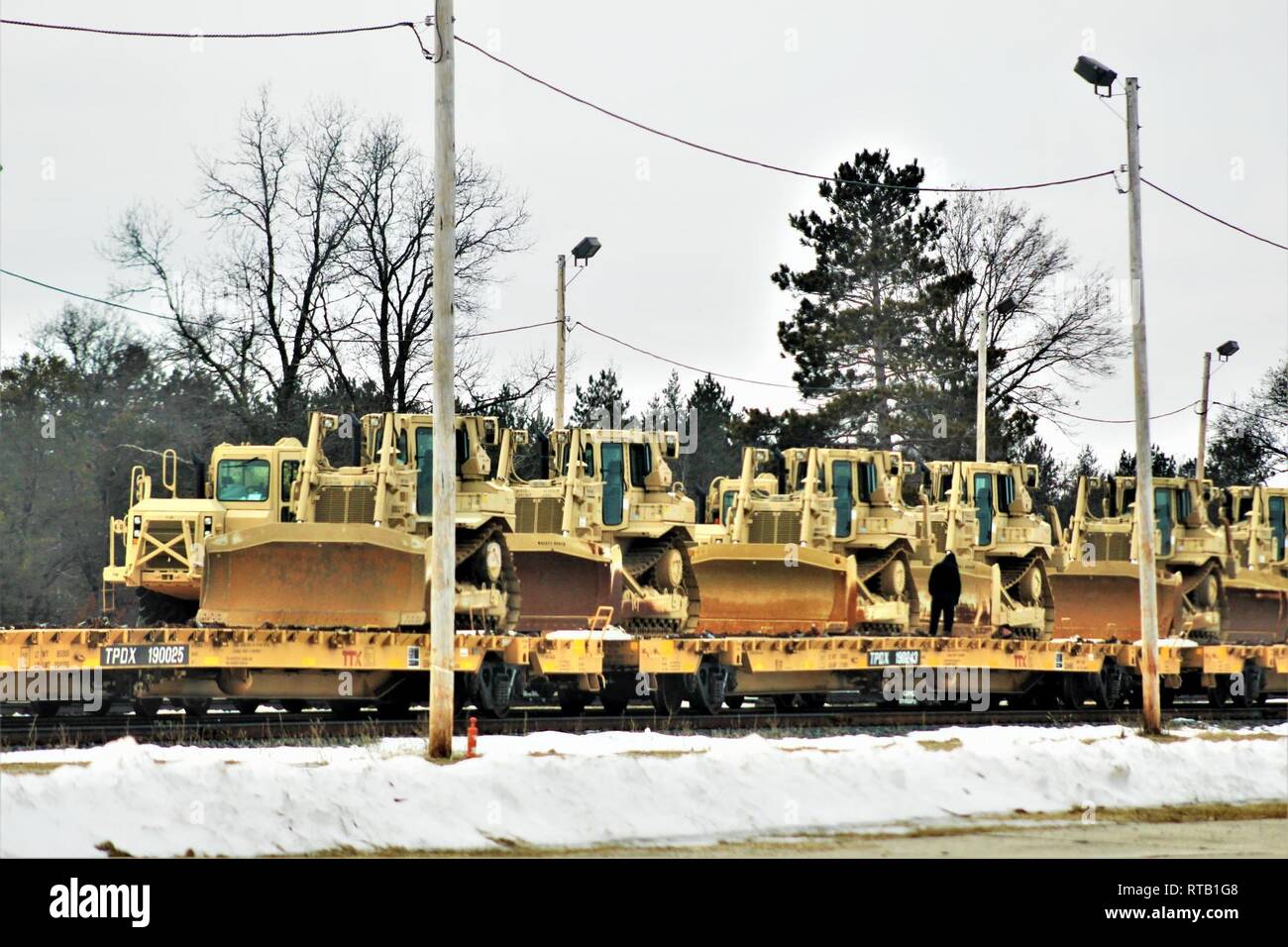Military vehicles and equipment with the 389th Engineer Battalion is ...