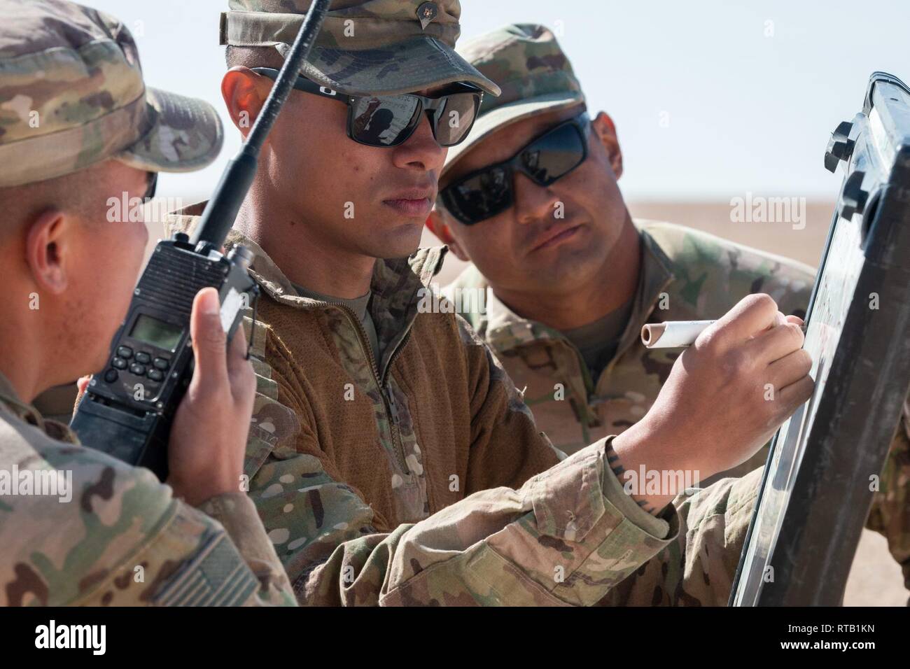 California Army National Guard Spc. Javier Ortiz (left), Angel J ...