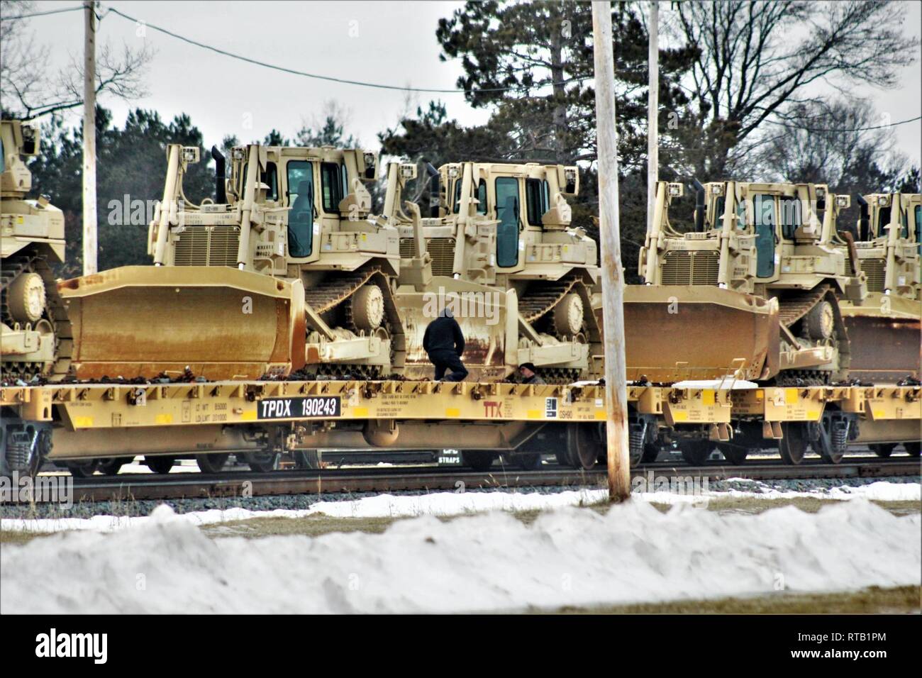 Military vehicles and equipment with the 389th Engineer Battalion is ...