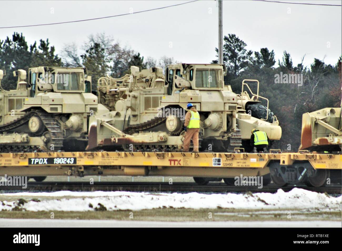 Military vehicles and equipment with the 389th Engineer Battalion is ...