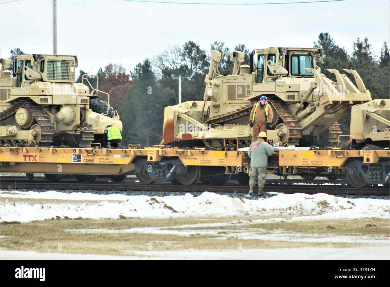 Military vehicles and equipment with the 389th Engineer Battalion is ...