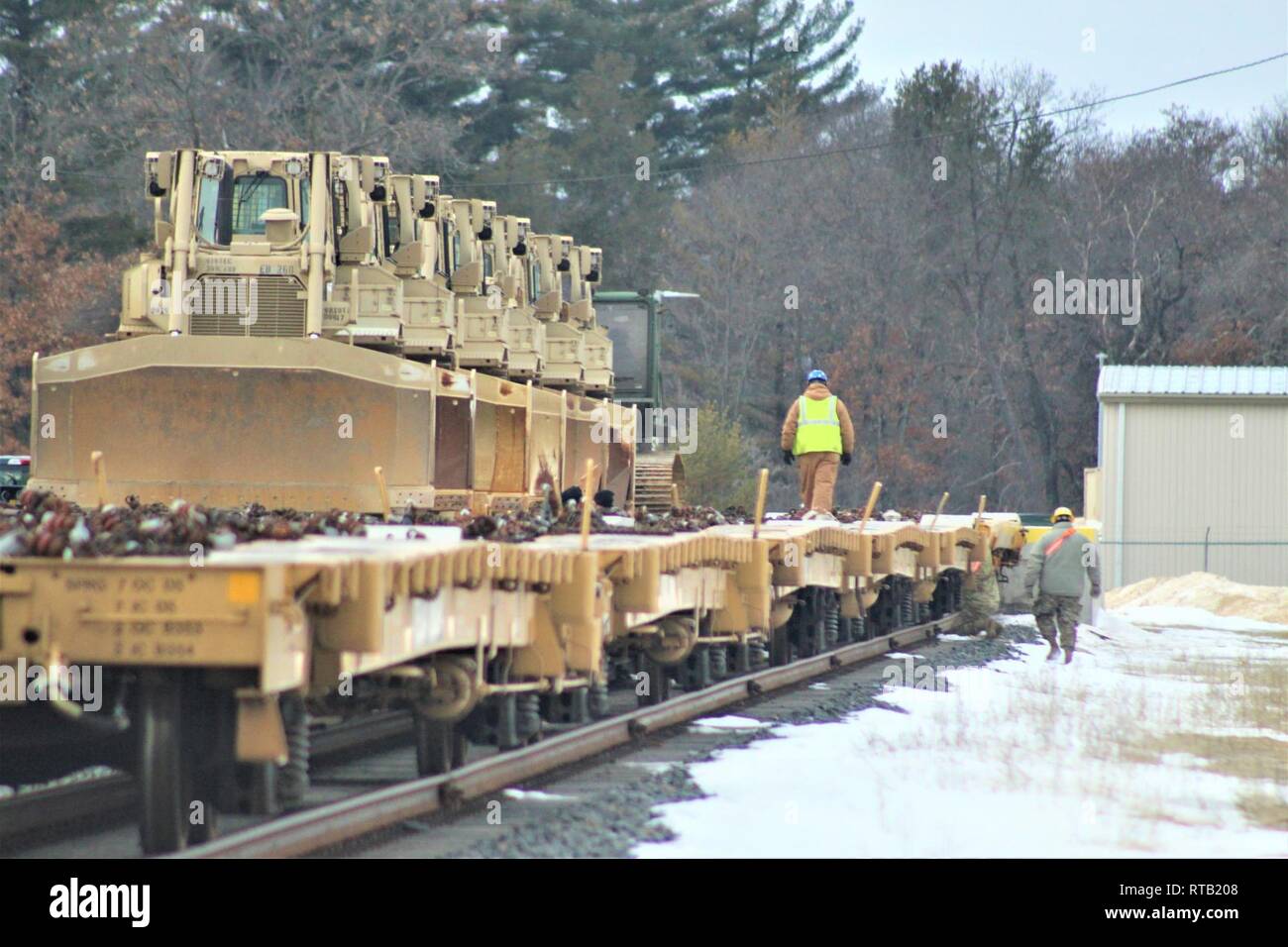 Military vehicles and equipment with the 389th Engineer Battalion is ...