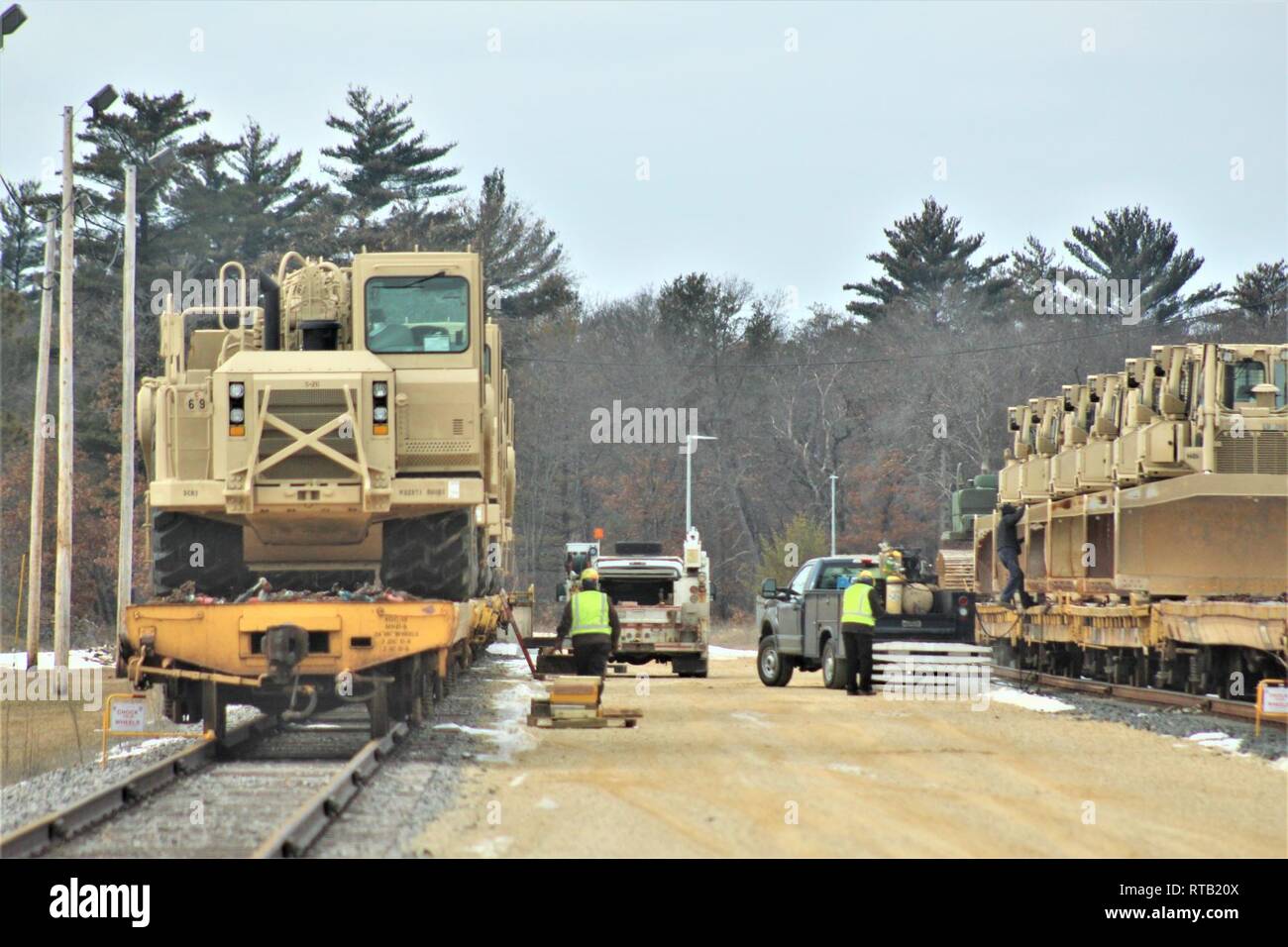 Military vehicles and equipment with the 389th Engineer Battalion is ...