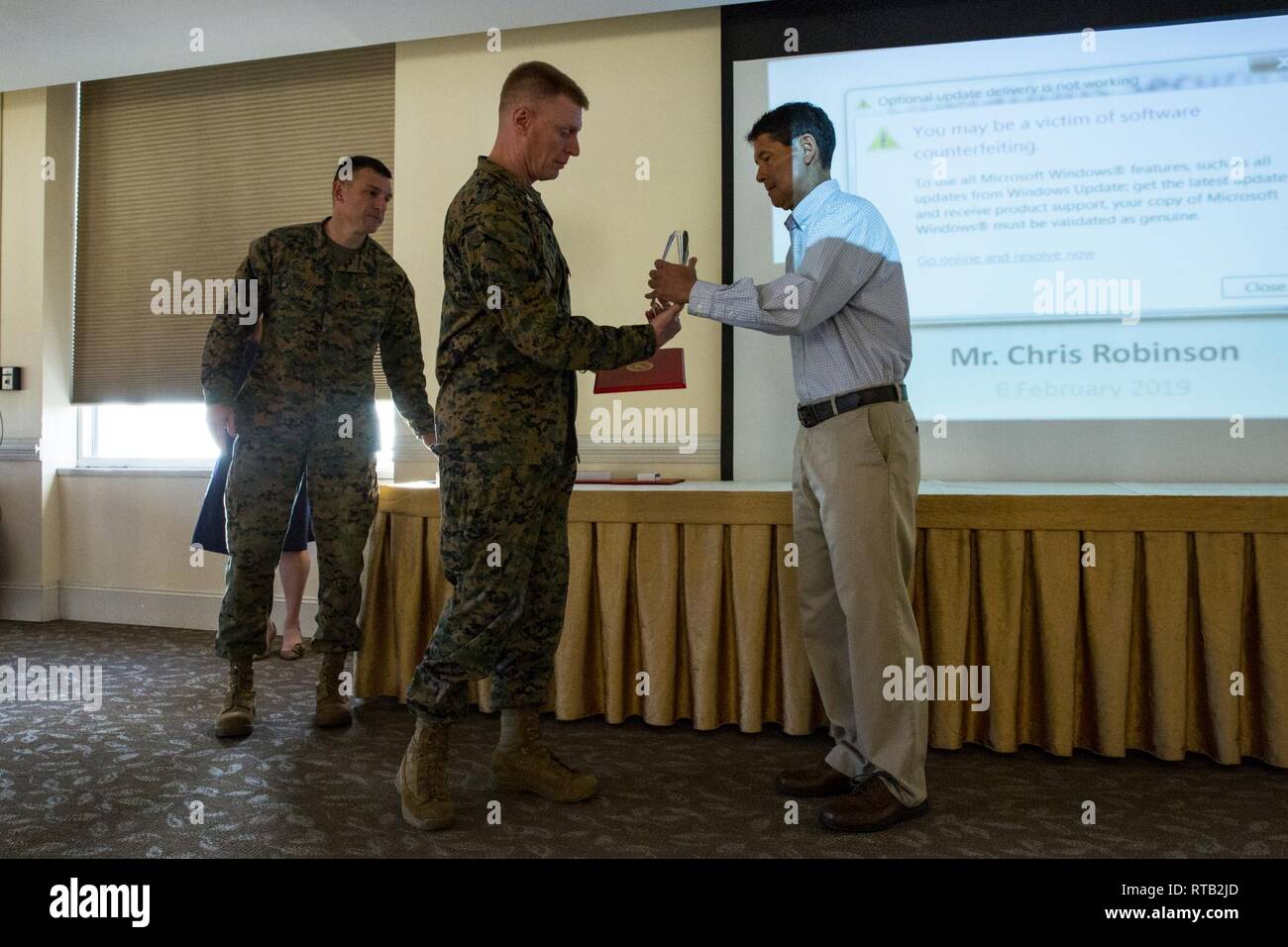 Sgt. Maj. Roger F. Griffith, left, sergeant major, and Col. Russell C ...