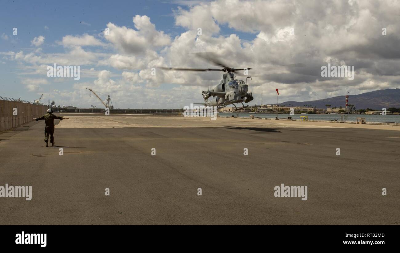 U.S. Marines with Marine Light Attack Helicopter Squadron 367 (HMLA-367 ...