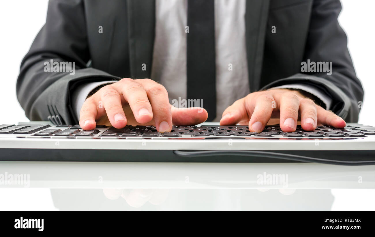 Front view of insurance agent typing on computer on his white office ...