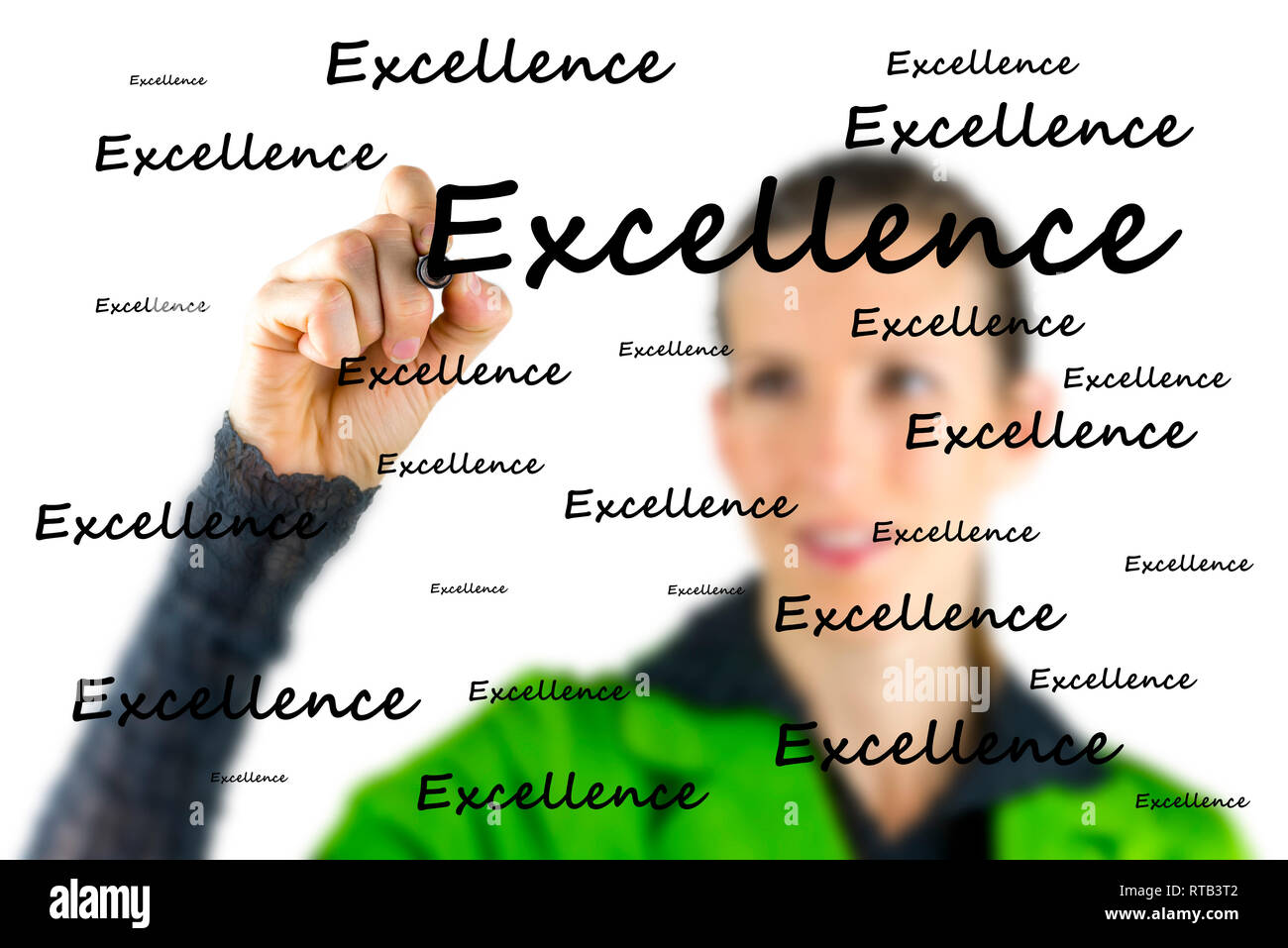 Young female writing word Excellence on virtual screen Stock Photo - Alamy