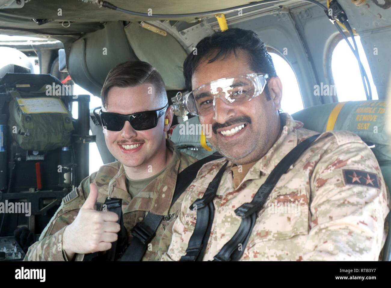 U.S. Army Spc. Alex Walters, 452d Combat Support Hospital, poses with a ...