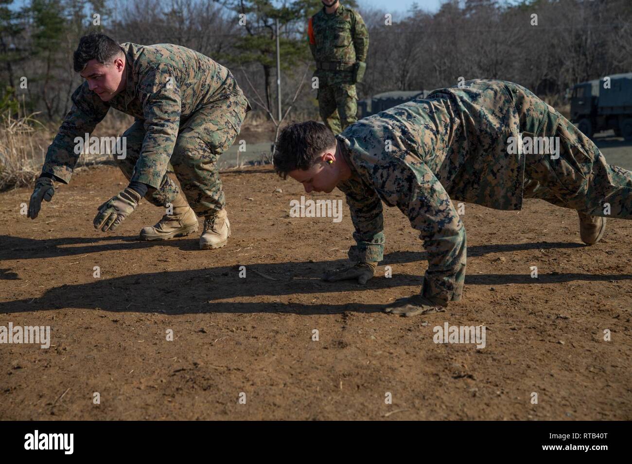 U.S. Marine Sgt. Brannon Harnacke (left) And U.S. Marine Cpl. Joseph ...