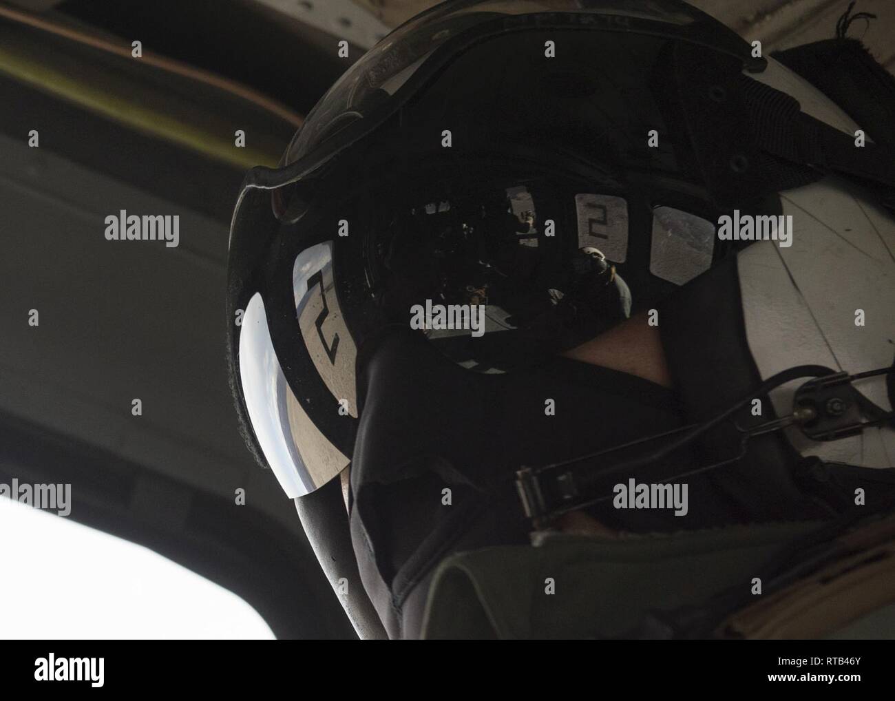 U.S. Navy Aviation Warfare Systems Chief Marcus Monreal, a Helicopter ...
