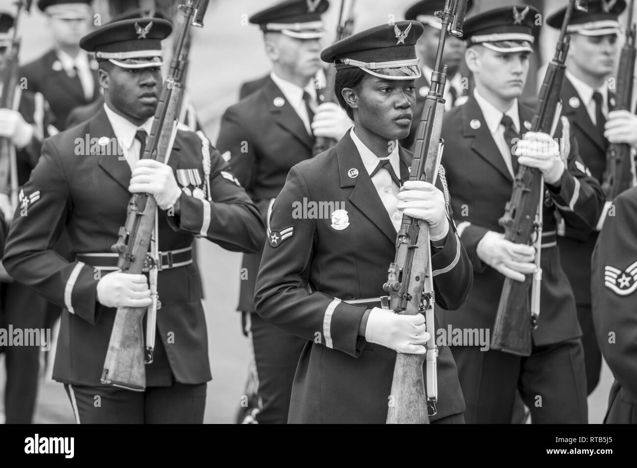The U.S. Air Force Honors Guard helps conduct military funeral honors ...