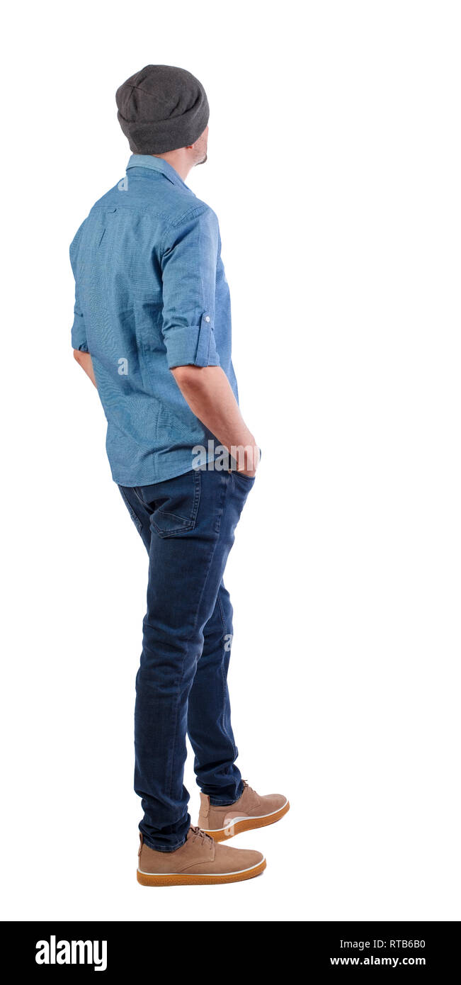 Back view of man in gray hat. Standing young guy. Rear view people ...