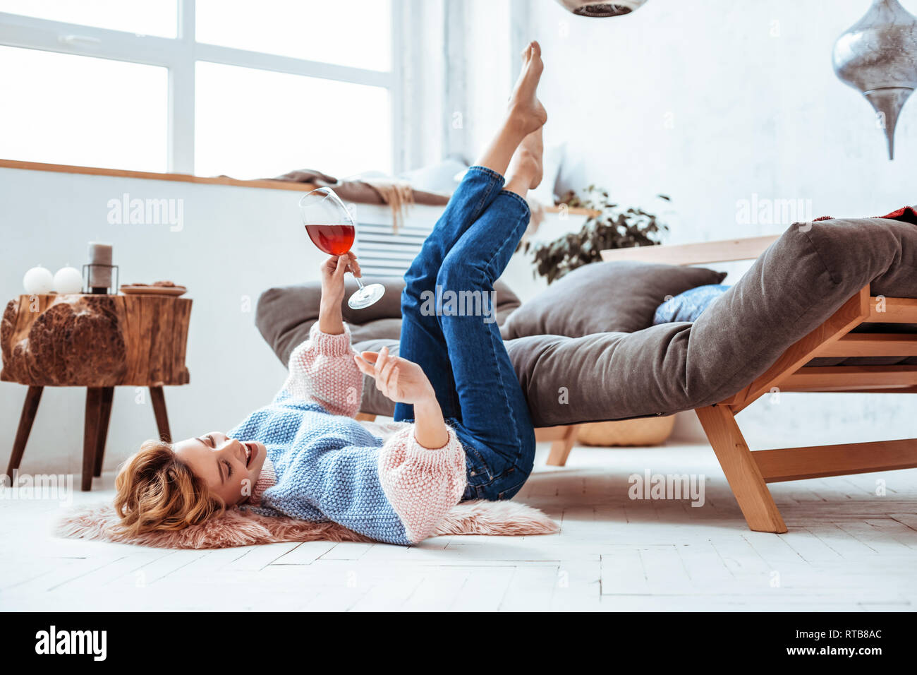 Joyful positive woman enjoying her time at home Stock Photo - Alamy