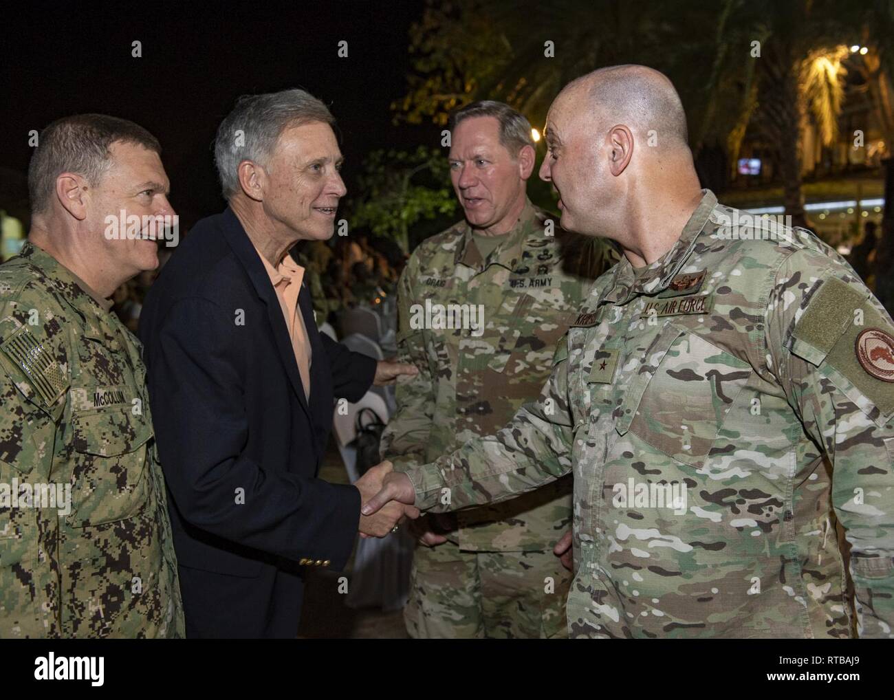 DJIBOUTI - Assistant Secretary of the Navy Gregory J. Slavonic (left ...