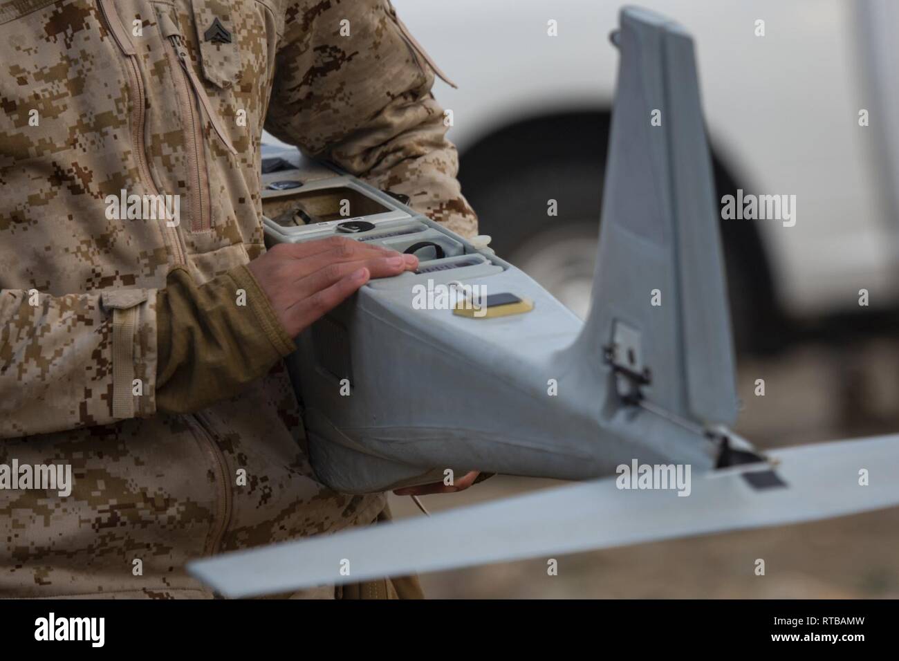A U.S. Marine with India Company, 3rd Battalion, 3rd Marine Regiment ...