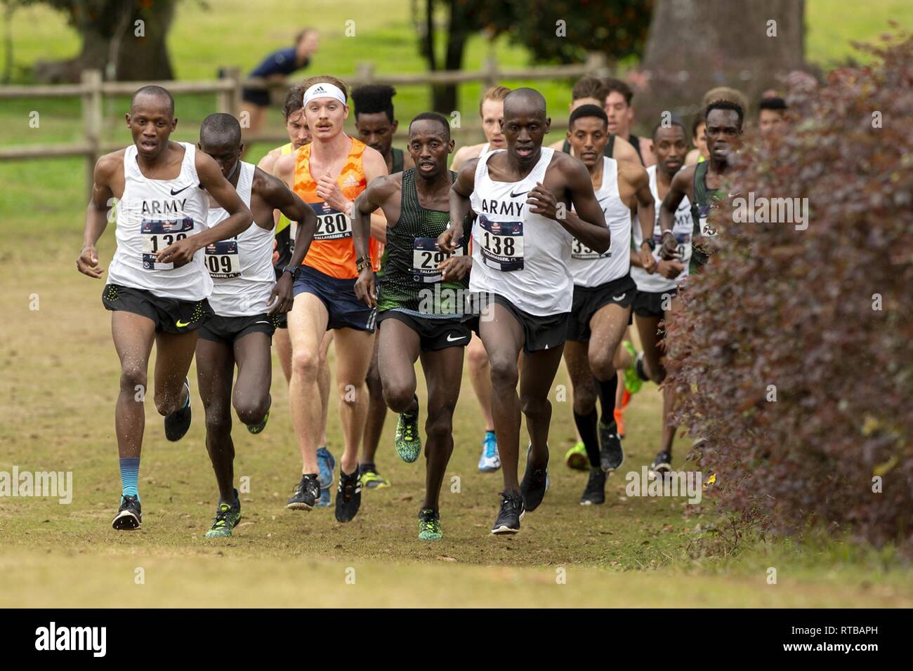 Army runners compete with their peers as the top cross country runners ...