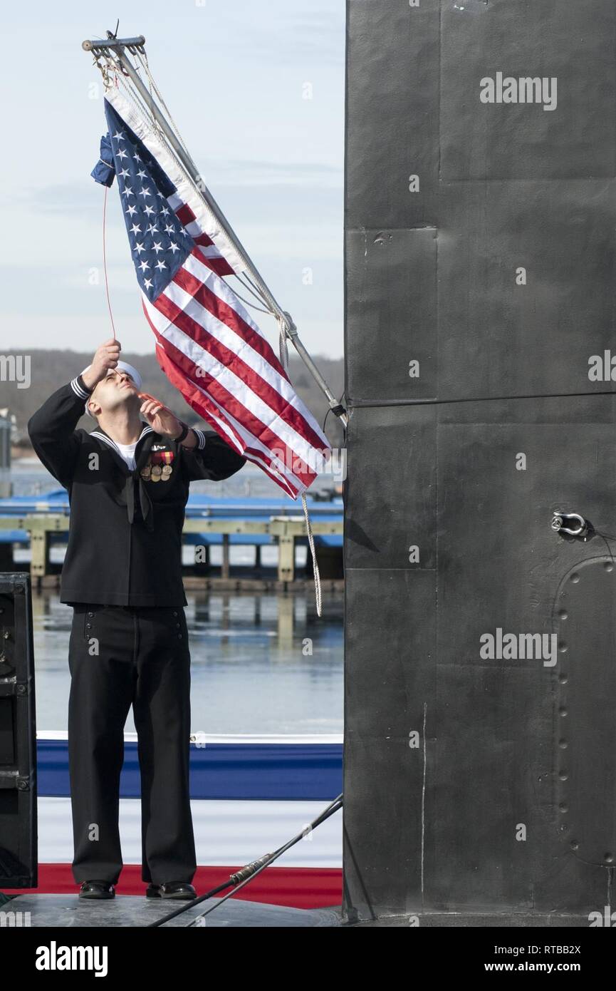 ETV2 (SS) Mark Gonzalez unfurls the commissioning pennant moments after ...