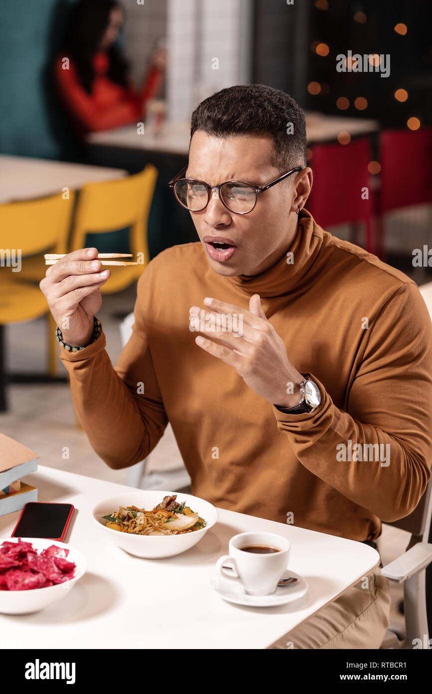 Customer surprised because ordered meal in Asian restaurant very spicy ...