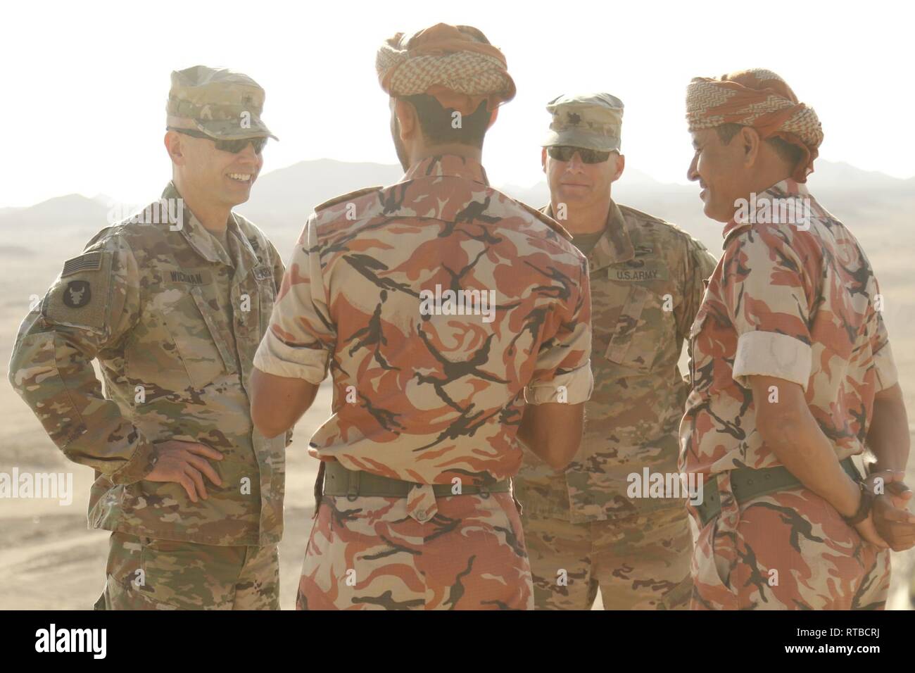 U.S. Brig. Gen. Michael Wickman, left, deputy commanding general for ...