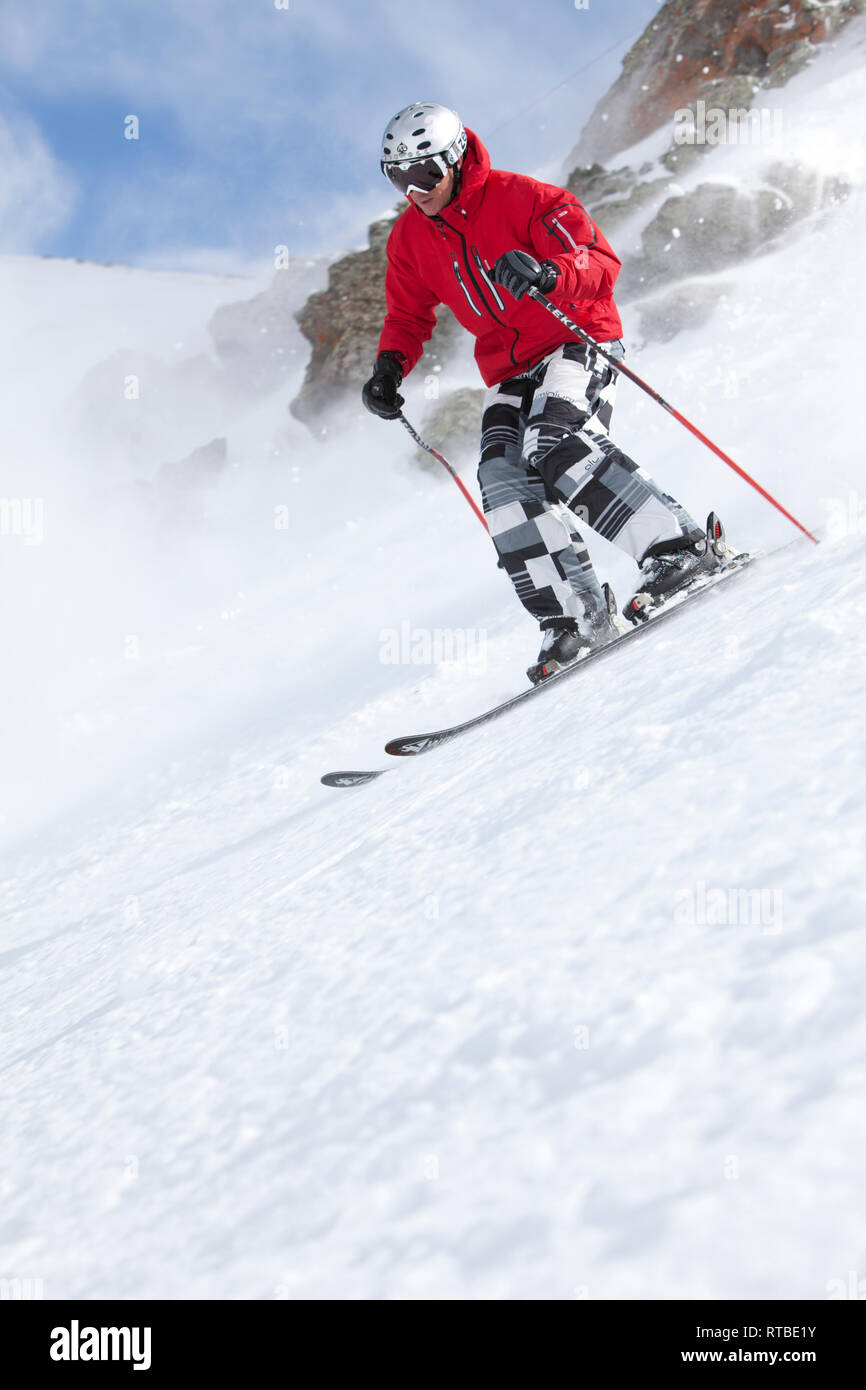 Snow Skiing action Stock Photo - Alamy
