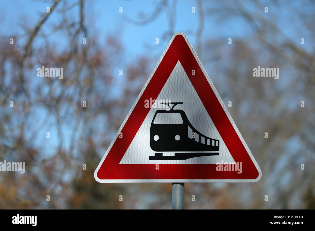 railway train warning sign Stock Photo - Alamy