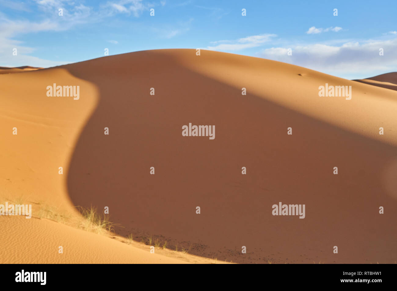 Desert with sand hills and blue heaven with sunshine in Marrakesh ...