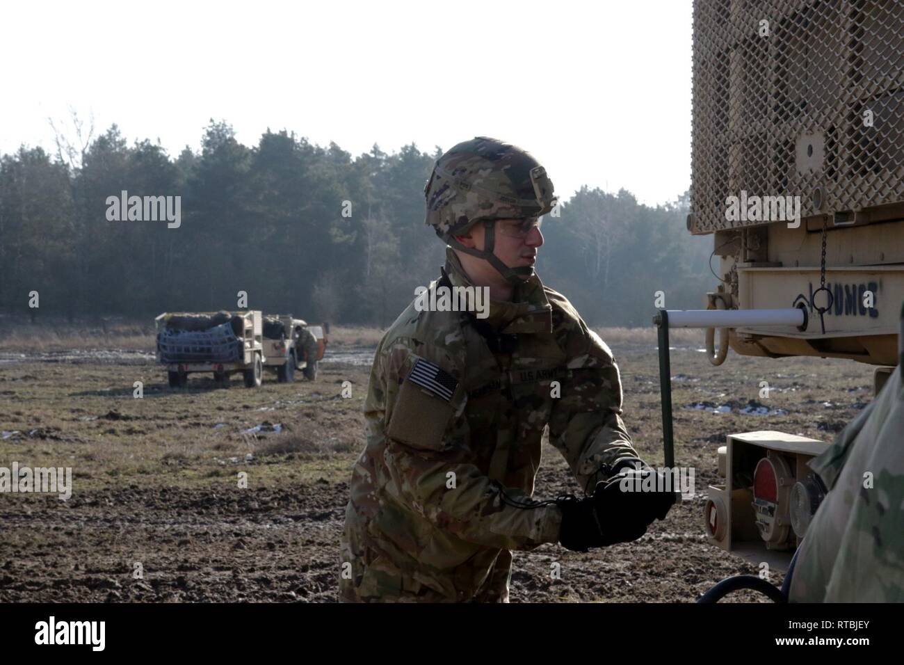 Spc. James Shearman, a fire control specialist with the Mission Command ...