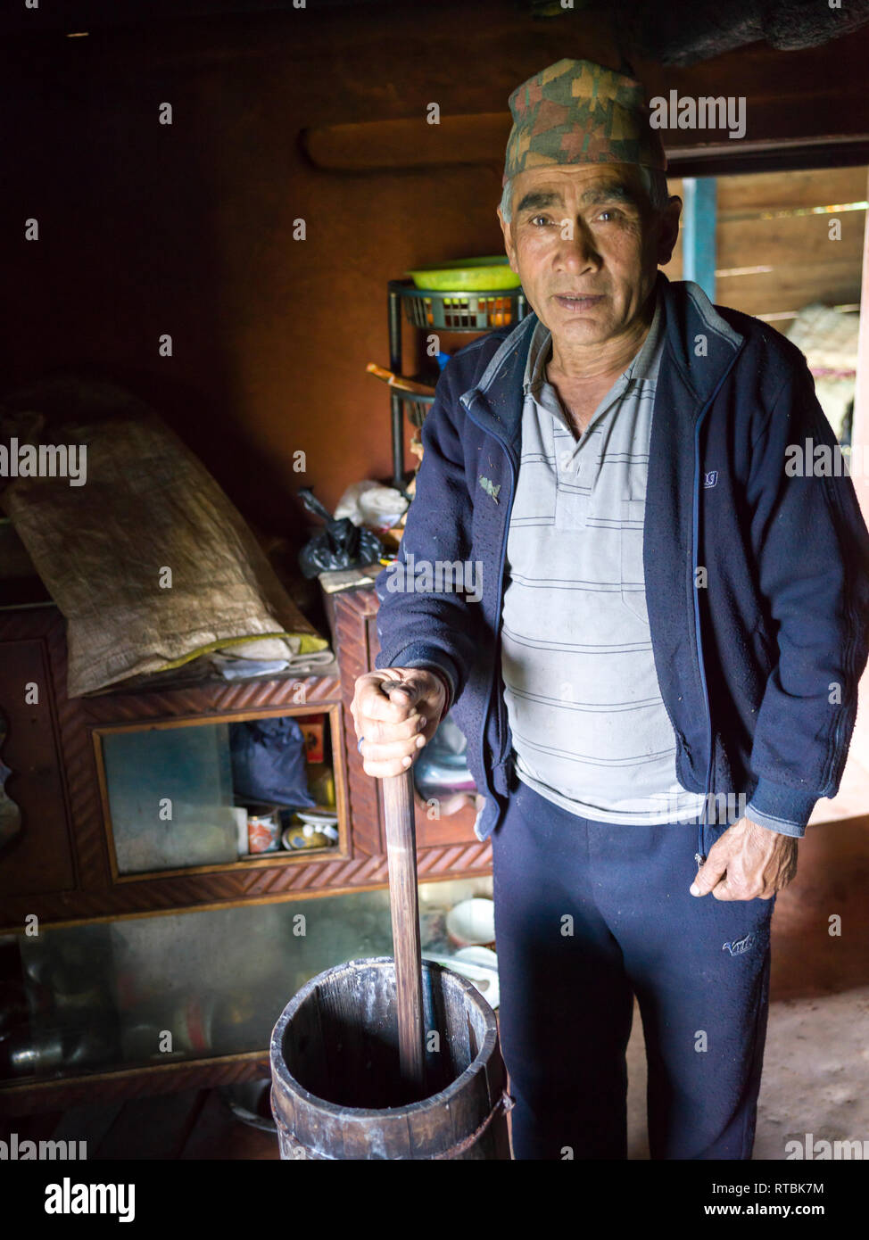 Man making rice beer, Sikkim, India Stock Photo - Alamy