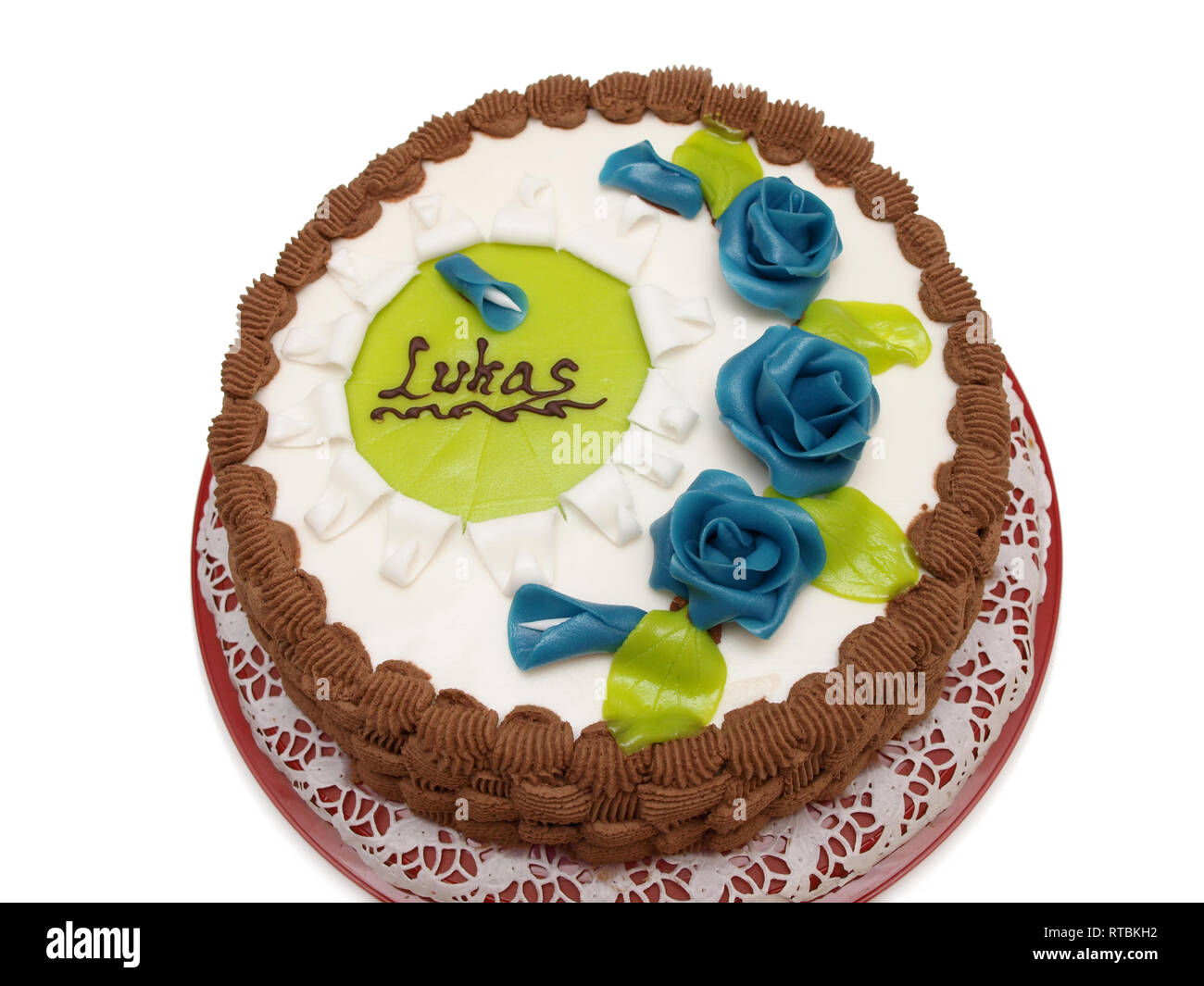 Baptism cake, white sugar paste, blue roses Stock Photo - Alamy