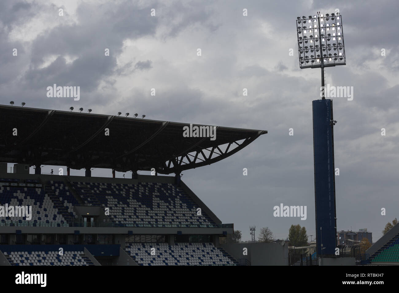 Partially lit Lighting System of a Football Stadium Stock Photo - Alamy