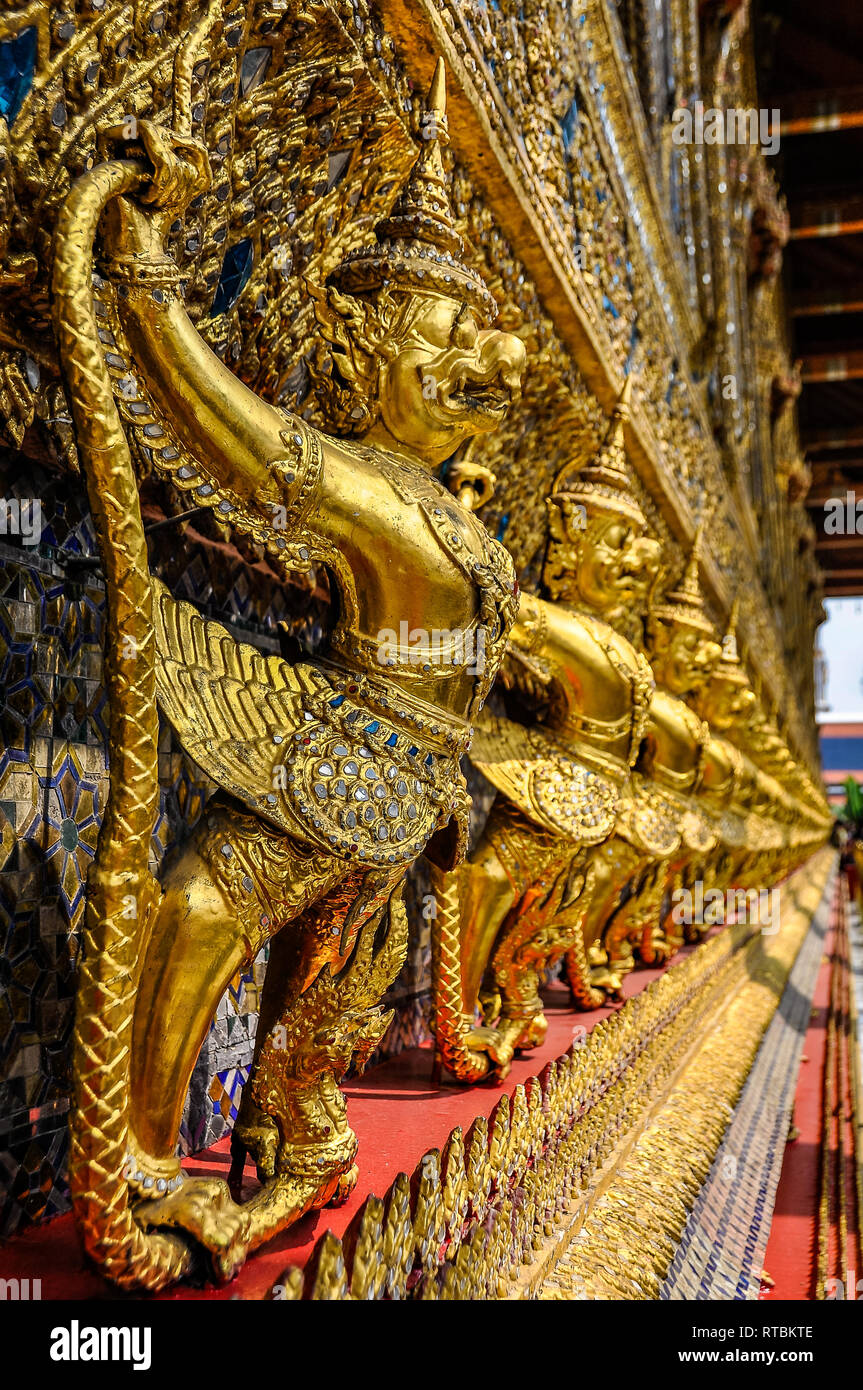 Golden statues in the Grand Palace in Bangkok, Thailand Stock Photo - Alamy