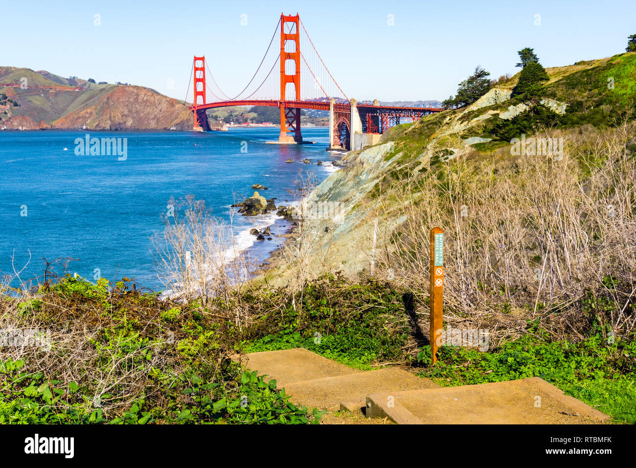 View towards Golden Gate bridge from the coastal trail, Presidio park ...