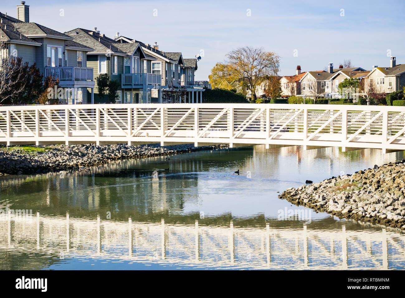 Bridge over man made waterway, Redwood shores, San Francisco bay area ...