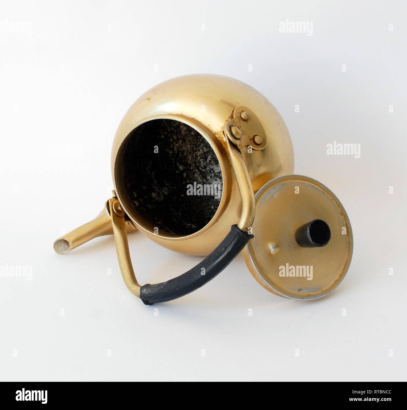 Beautiful golden vintage kettle isolated on white background Stock ...