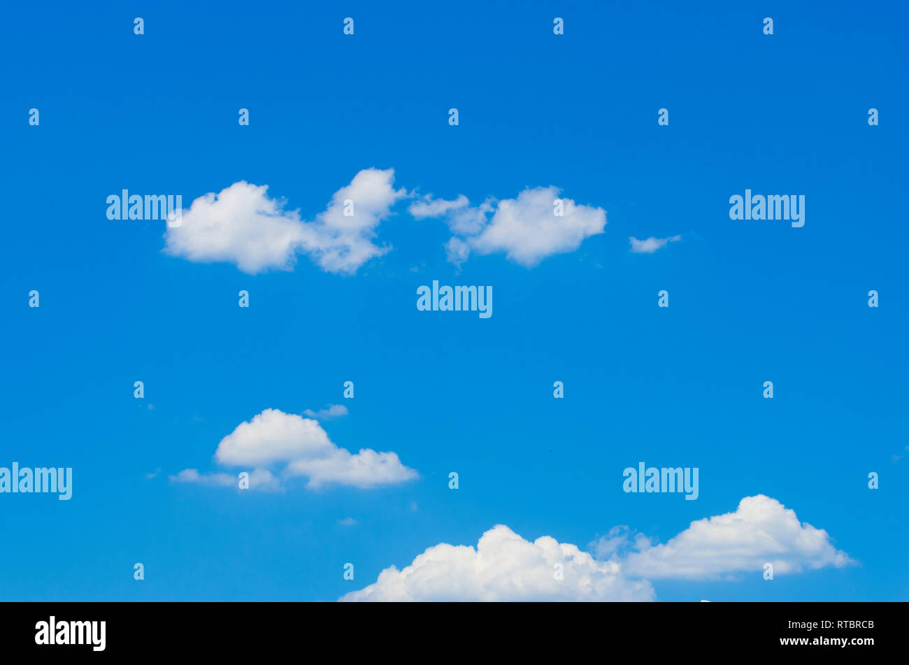 bright light illuminates the clouds like cream in the blue sky symbol ...