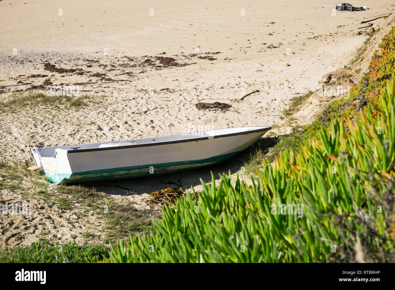 Boat shipwrecked on a beach, California Stock Photo - Alamy