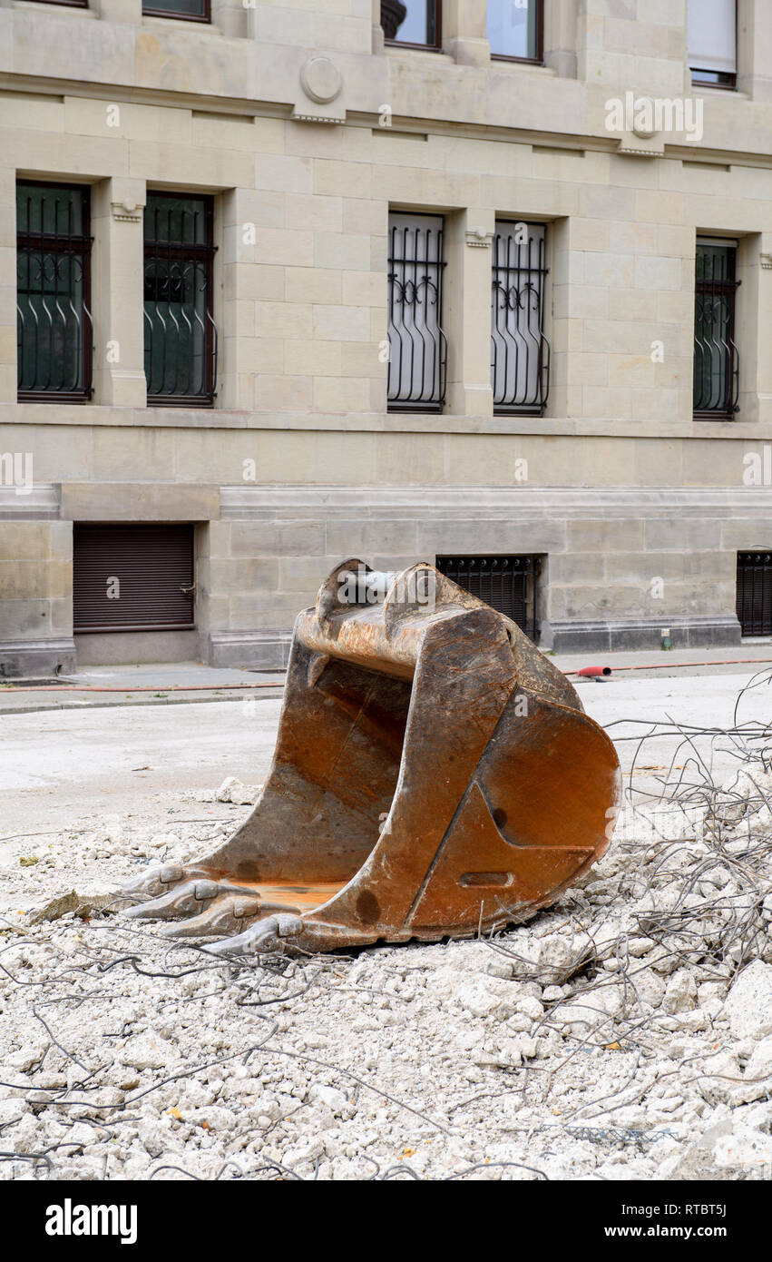 Backhoe bucket of an excavator at a demolition construction site Stock ...