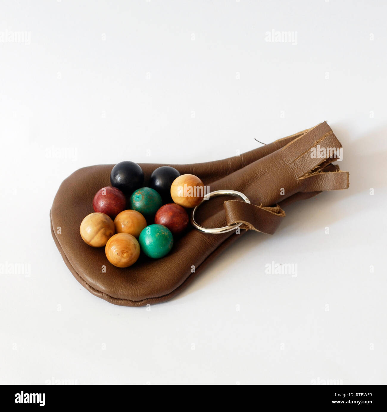 Old toy marbles in leather bag Stock Photo - Alamy