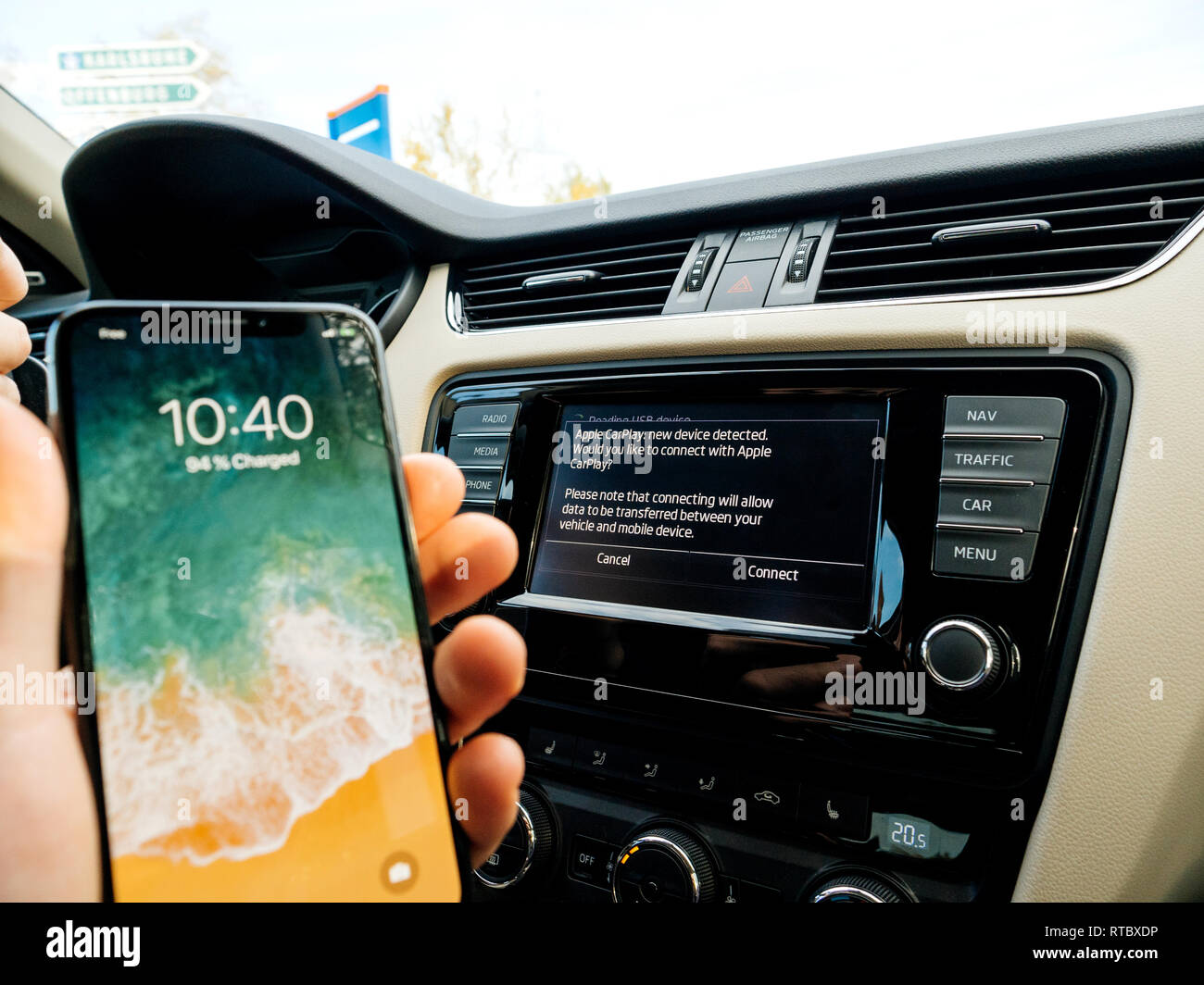 FRANKFURT, GERMANY - NOV 4, 2017: Man connecting his new iPhone X 10 to ...