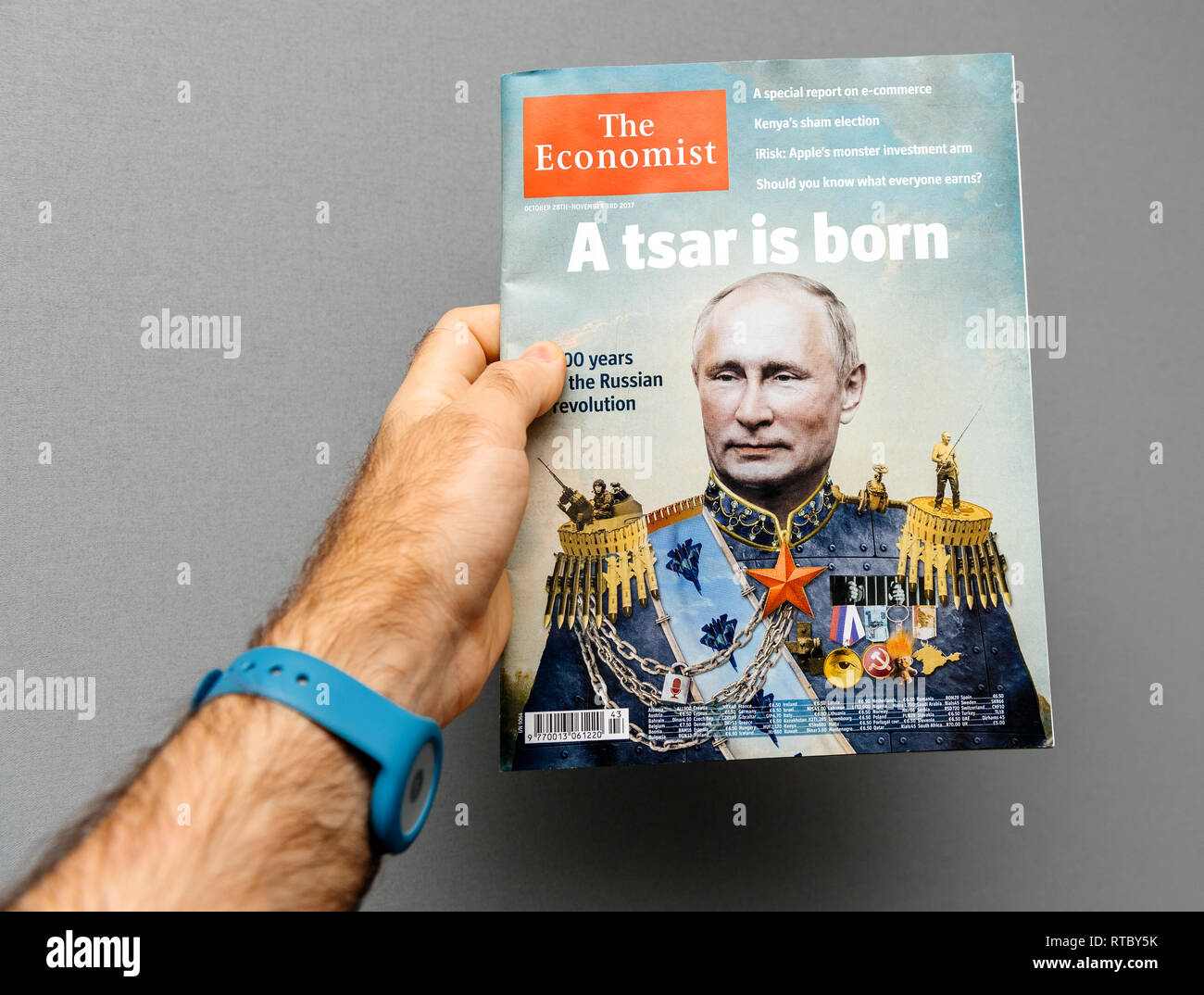 STRASBOURG, FRANCE - OCT 28, 2017: Man holding The Economist magazine ...