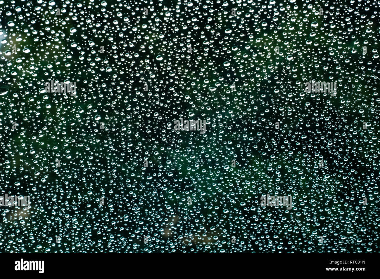 Rain drops on a window, abstract background Stock Photo - Alamy