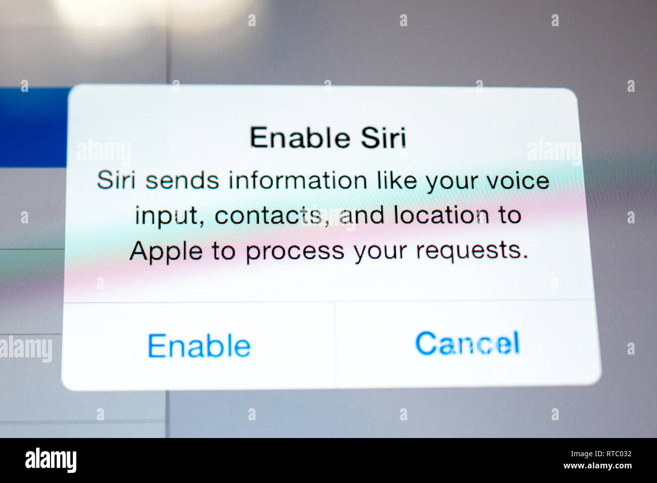 PARIS, FRANCE - SEP 18, 2014: Enable Siri personal voice assistant on ...