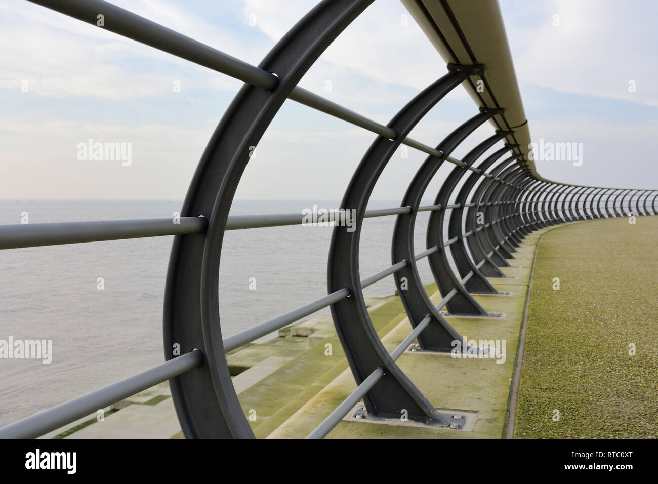 Curved stainless steel balustrade pedestrian guard railing fixed to ...