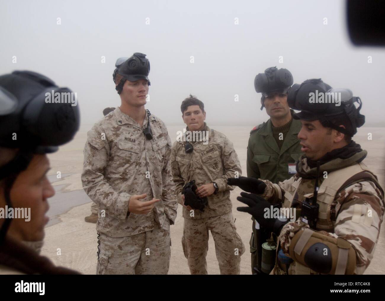 Moroccan special operations forces receive a brief from U.S. Marines ...