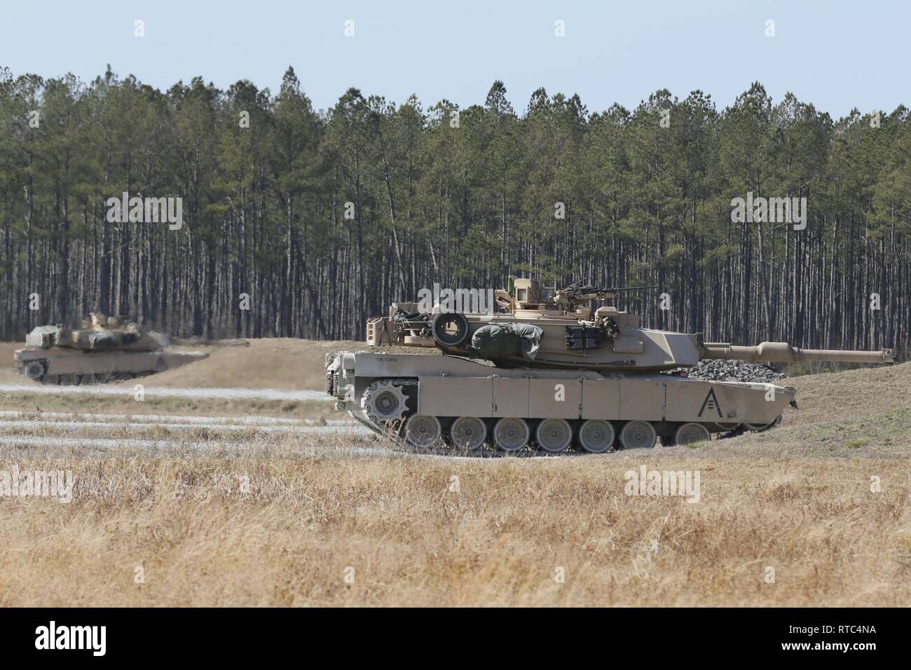 U.S. Marines with 2nd Tank Battalion, 2nd Marine Division, maneuver ...
