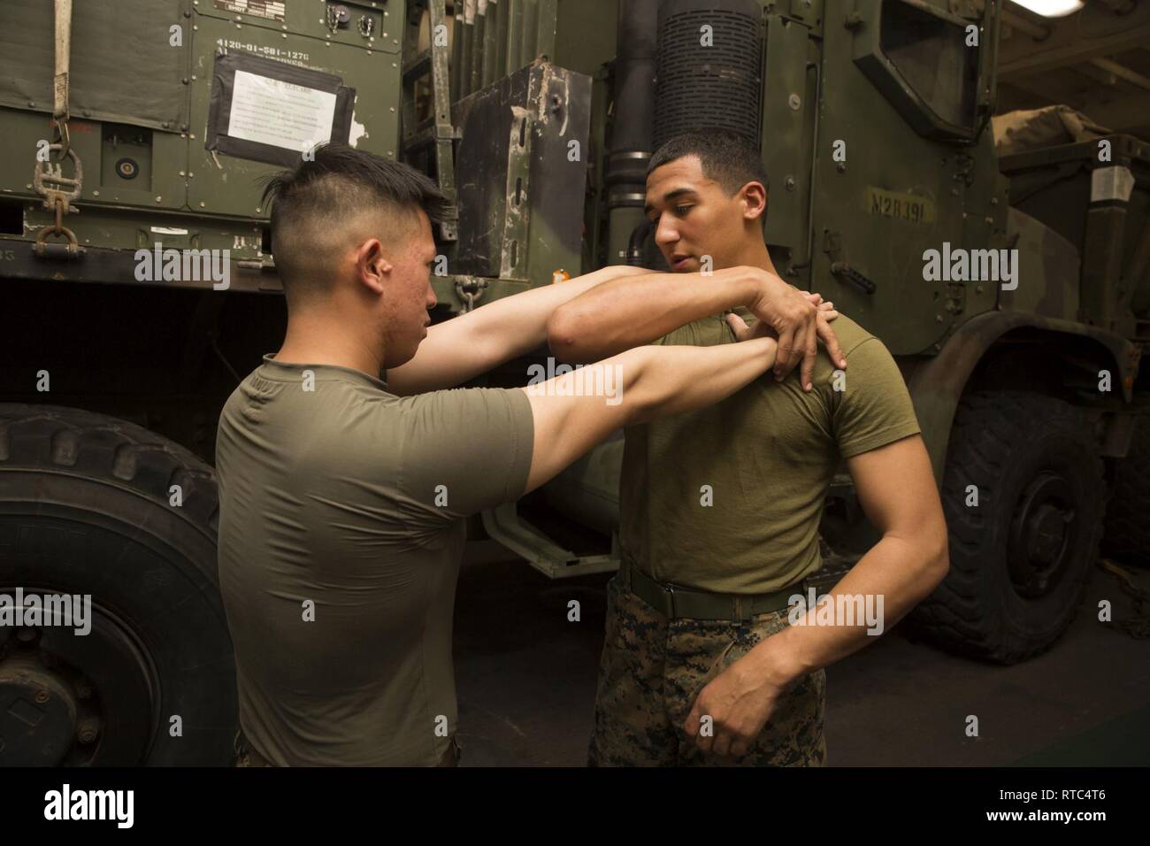 WESTERN PACIFIC (Feb. 8, 2019) U.S. Marine Lance Cpl. Danny Chung, left ...
