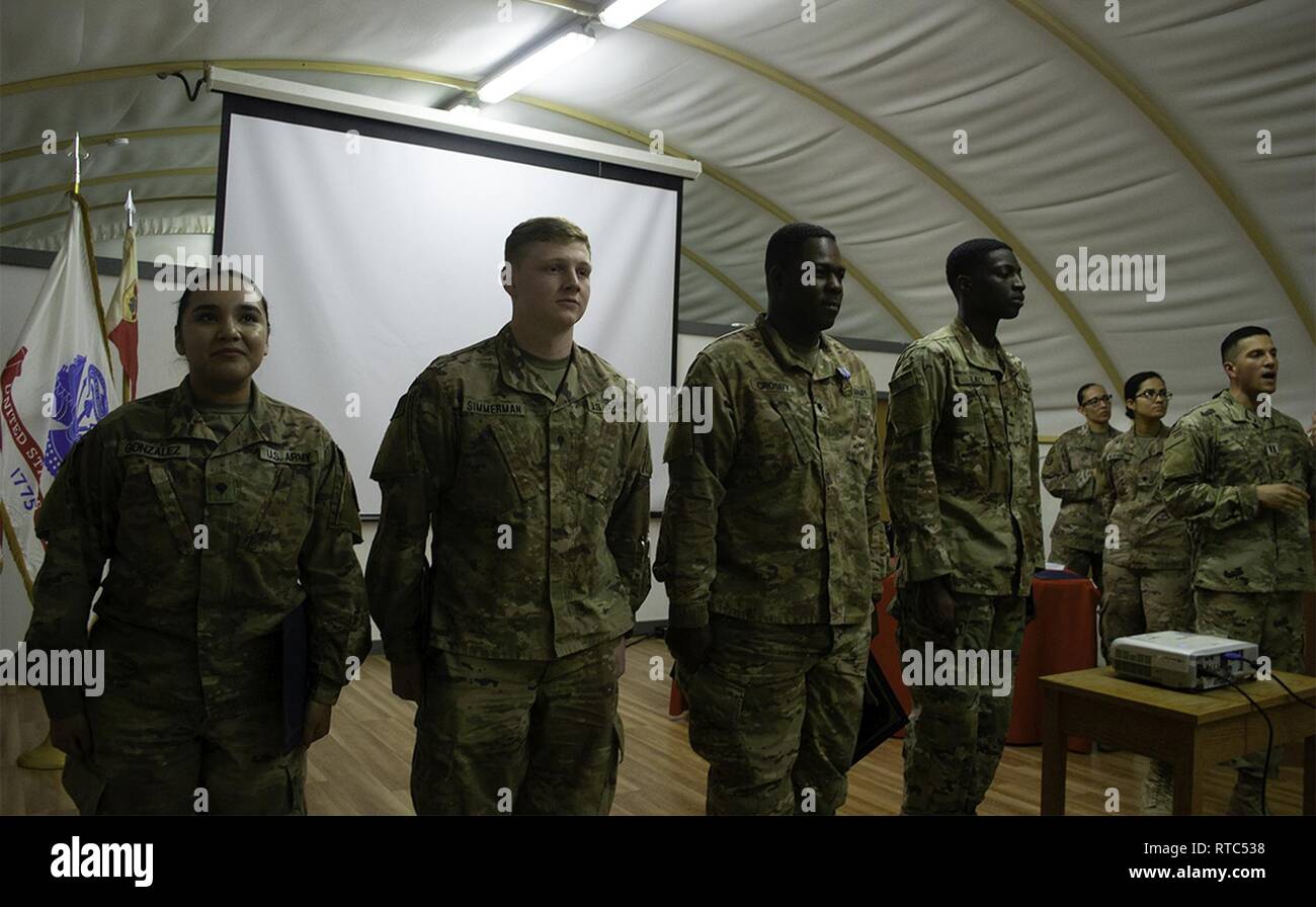 Soldiers from the 300th Sustainment Brigade are recognized by Capt ...