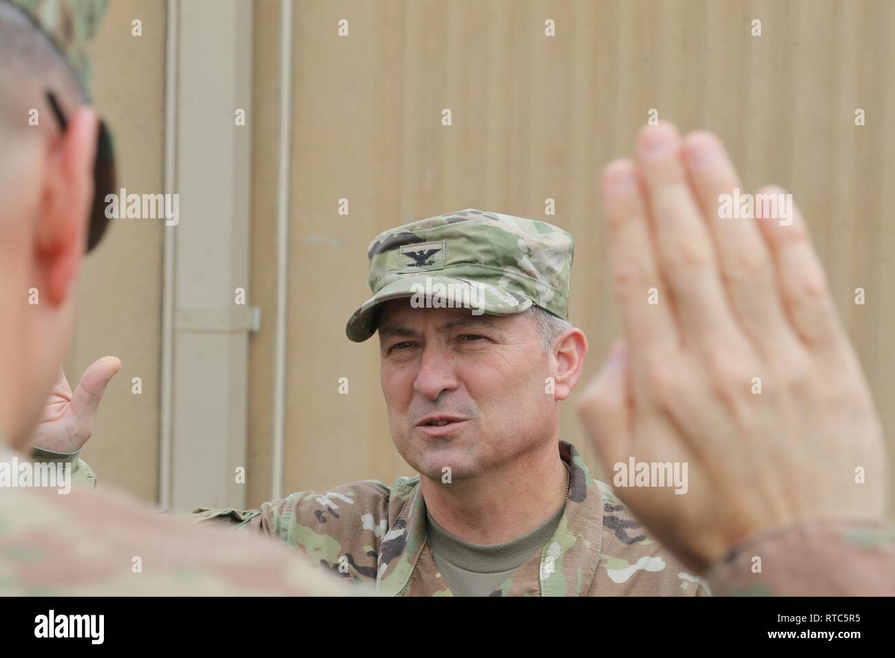 Col. Anthony Smith recites his oath of office given by Brig. Gen. Clint ...