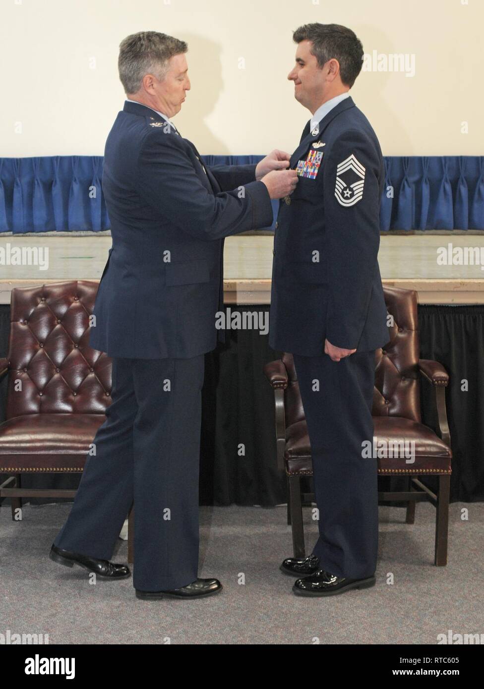 Col. John O’Brien, 111th Attack Wing Operations Group commander, pins a ...