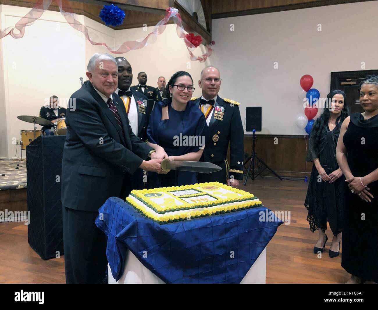The youngest and the oldest member of the 81st Readiness Division cut ...